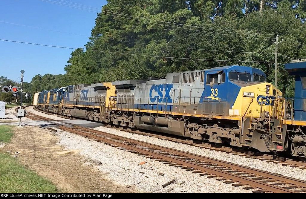 CSX AC44CW 33 runs second in a set of 5 units rolling mixed freight SB